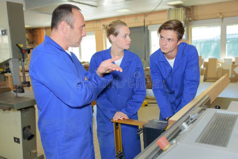 Carpenter and Apprentice in Workshop Stock Image - Image of carpentry ...