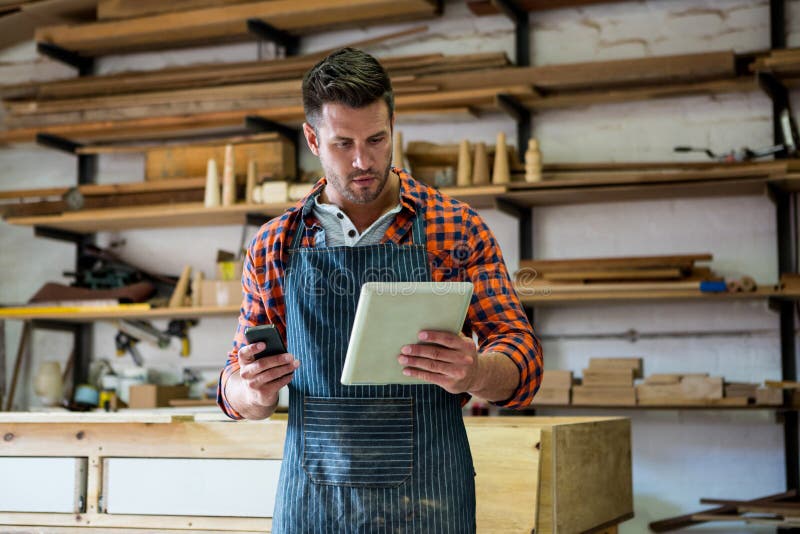 Carpenter Reading a Level on a House Frame Stock Photo - Image of house ...