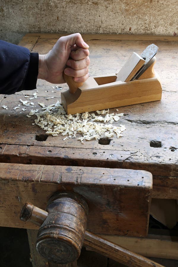 Carpenter S Hand in the Carpentry Workshop with a Plane Stock Photo ...