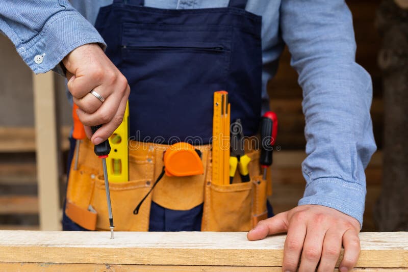 Carpenter`s Hands Measuring Plank Stock Image - Image of instrument ...