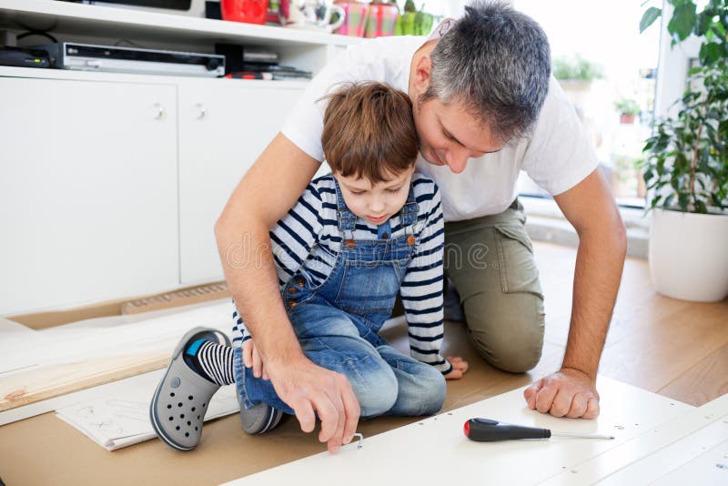 Carpenterâ€™s Little Helper Stock Photo - Image of help, instructions ...
