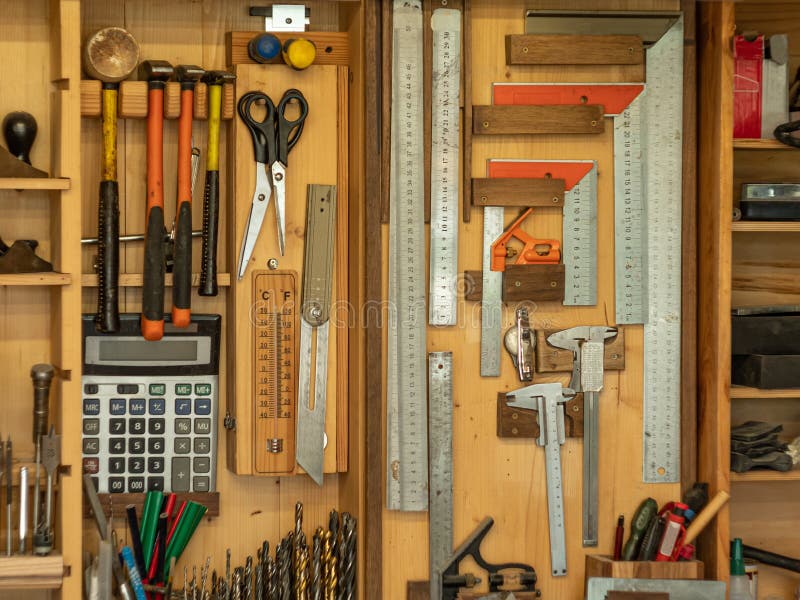 Carpenter S Workshop. Various Tools Hang on a Wooden Wall Stock Photo ...