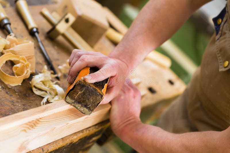 Carpenter with Sanding Block in Carpentry Stock Photo - Image of manual ...