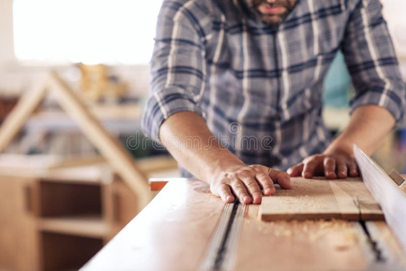 Skilled Young Woodworker Standing in His Workshop Full of Tools Stock ...