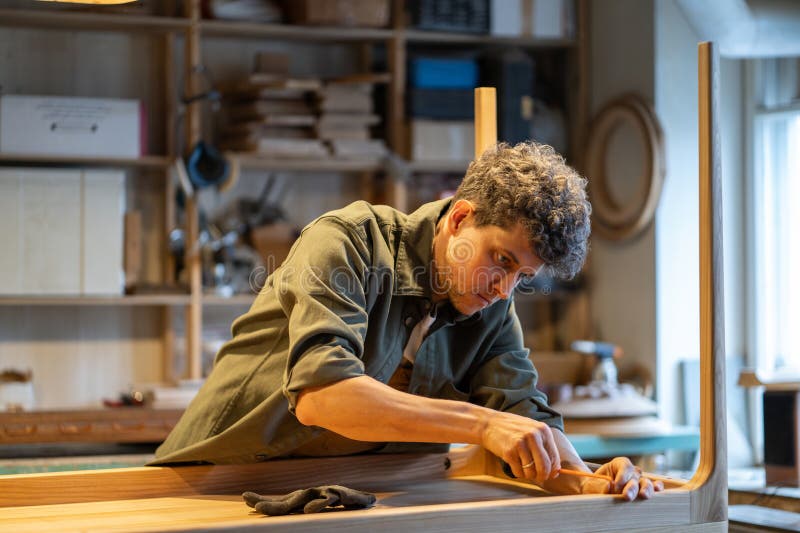 Passionate Woodworker Attaching Nuts and Bolts with Screwdriver To ... Passionate Woodworker Attaching Nuts and Bolts with Screwdriver To ...