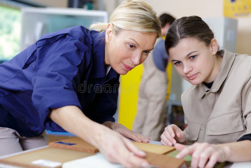 Carpenter and Apprentice in Workshop Stock Image - Image of carpentry ...