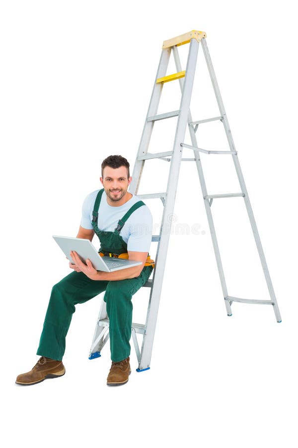 Carpenter Sitting on Ladder Using Laptop Stock Image - Image of ...