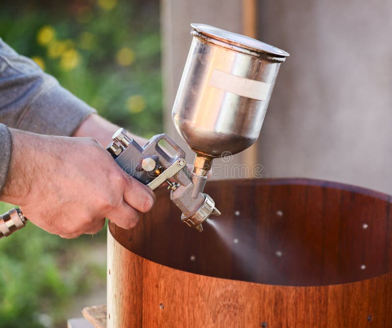 Carpenter Spraying Lacquer on Wooden Drum Shell Stock Image - Image of ...