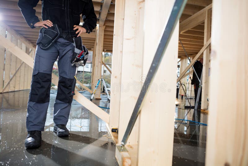 Carpenter Standing Arms Crossed at Construction Site Stock Photo ...