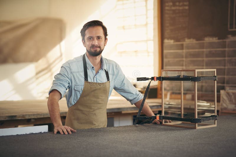 Carpenter Standing Proudly Alongside a Display Case he is Making Stock ...