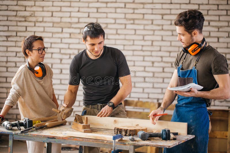 Carpenter with Students in Woodworking Workshop Stock Photo - Image of ...