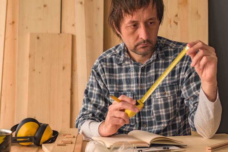 Carpenter with Tape Measure Tool Stock Photo - Image of authentic ...