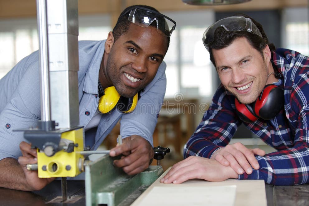 Carpenter Teaches Apprentice How To Use Saw Stock Image - Image of ...