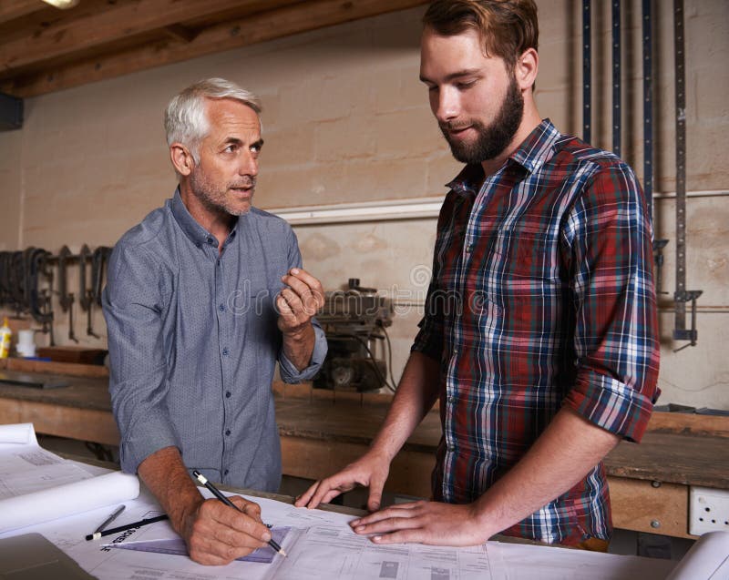 Carpenter, Team and Men Drawing Blueprint for Planning Construction ...