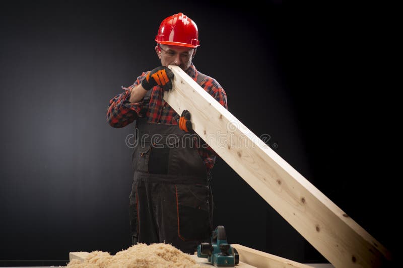 Carpenter Testing Wood Plank Evenness at Workshop Stock Image - Image ...