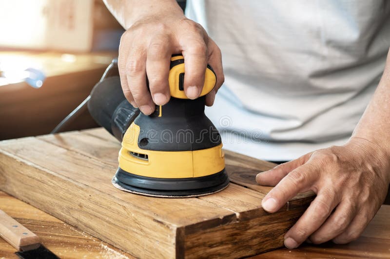 Carpenter Use Random Orbit Sander or Palm Sander Polishes Wooden in the ...