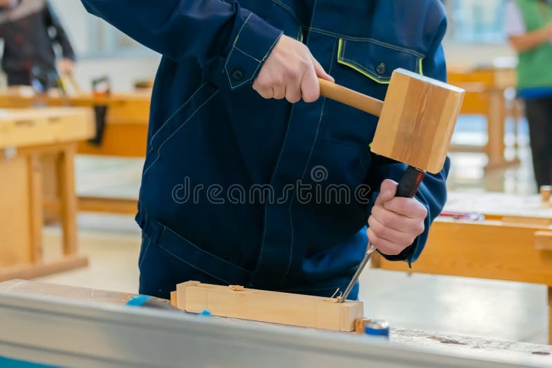 Carpenter Using Chisel and Hammer To Carve Wood - Close Up Stock Photo ...