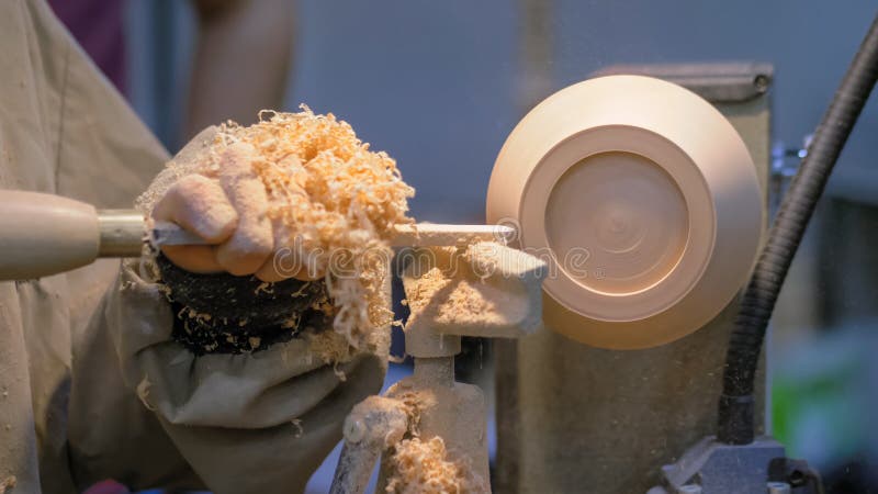 Carpenter Using Chisel for Shaping Piece of Wood on Lathe: Close Up ...