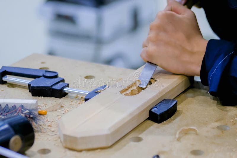 Carpenter Using Chisel To Carve Wood Stock Photo - Image of furniture ...