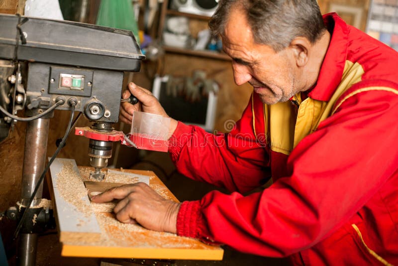 Male Using A Drill Press On Wood Stock Photo - Image of hole, tools ...