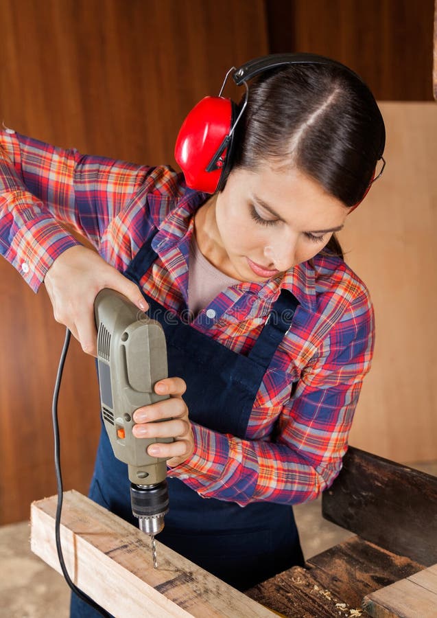 Carpenter Using Drilling Machine on Wood Stock Image - Image of person ...