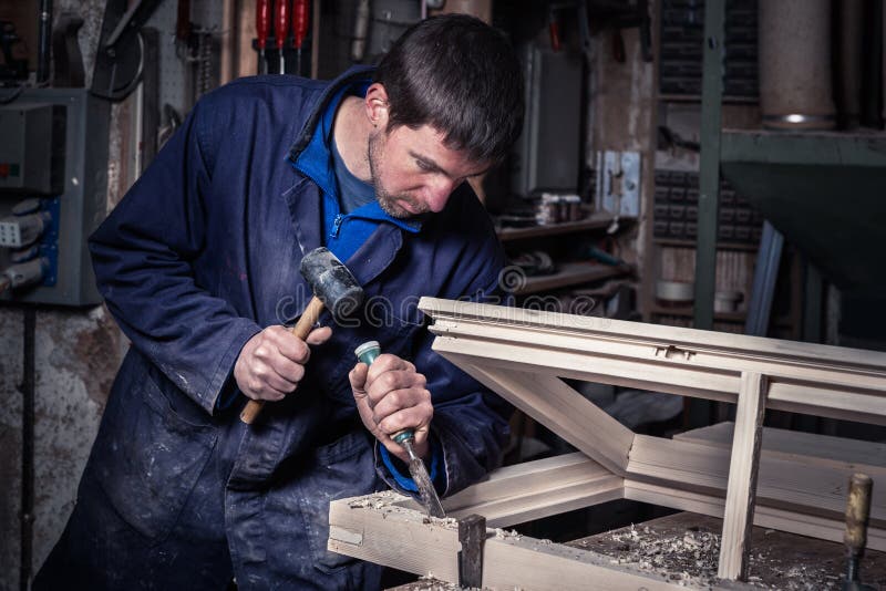 Carpenter Using Hammer and Chisel in Workshop Stock Image - Image of ...