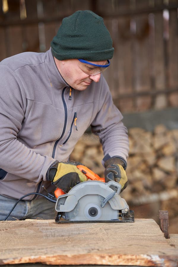 Carpenter Using Circular Saw Stock Image - Image of equipment, lumber ...