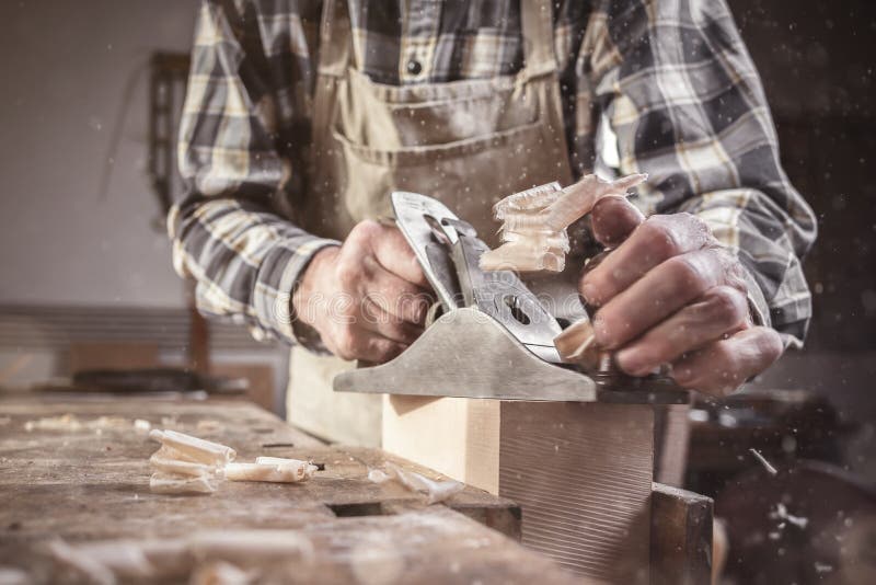 Carpenter Using a Planer in a Rustic Workshop Stock Image - Image of ...