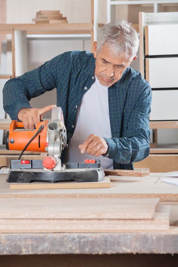 Carpenter Using A Power Tool Stock Image - Image of hand, wood: 31454439
