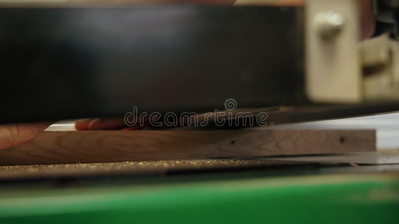 Carpenter Using Professional Wood Surface Planer Machine To Produce ...