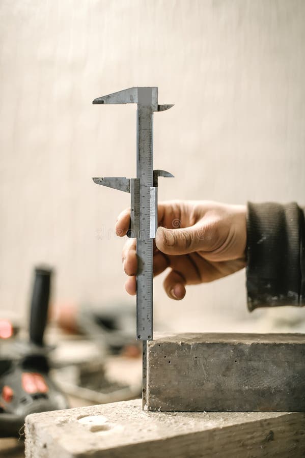 Carpenter Using Ruler for His Job in Carpentry Workshop Stock Photo ...