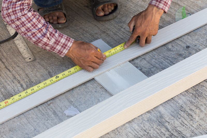 Carpenter Using Ruler To Draw Line Marking Stock Photos - Free ...