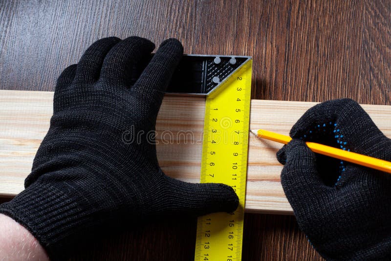Carpenter Using Square Ruler Pencil Measuring Wooden Board Construction ...
