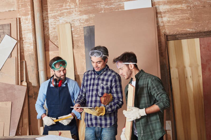 Carpenter Using Tablet Computer in Workshop Stock Image - Image of ...