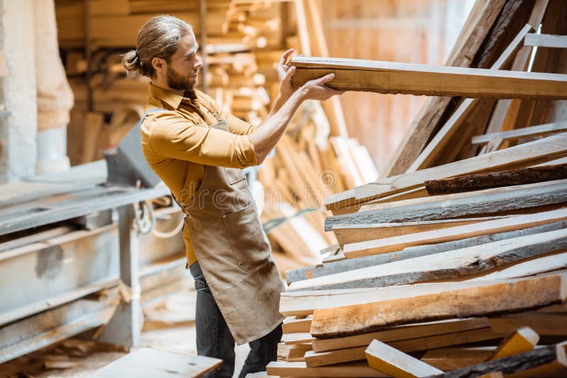 Carpenter at the Wood Storage Stock Photo - Image of stack, joiner ...
