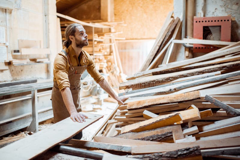 Carpenter at the Wood Storage Stock Image - Image of carpentry, stack ...