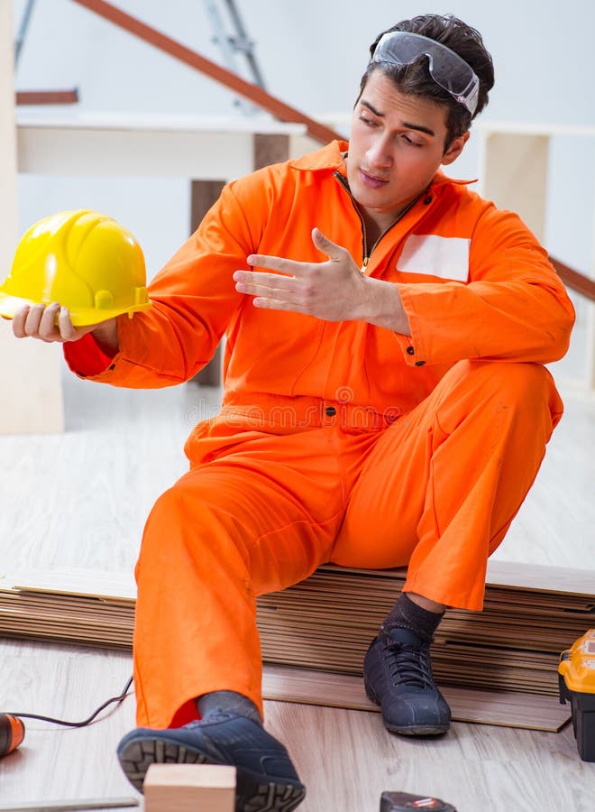 Carpenter Wearing Yellow Hardhat in Contractor Workshop Stock Image ...