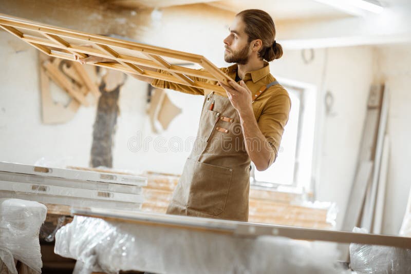 Carpenter with Window Frame at the Workshop Stock Photo - Image of ...