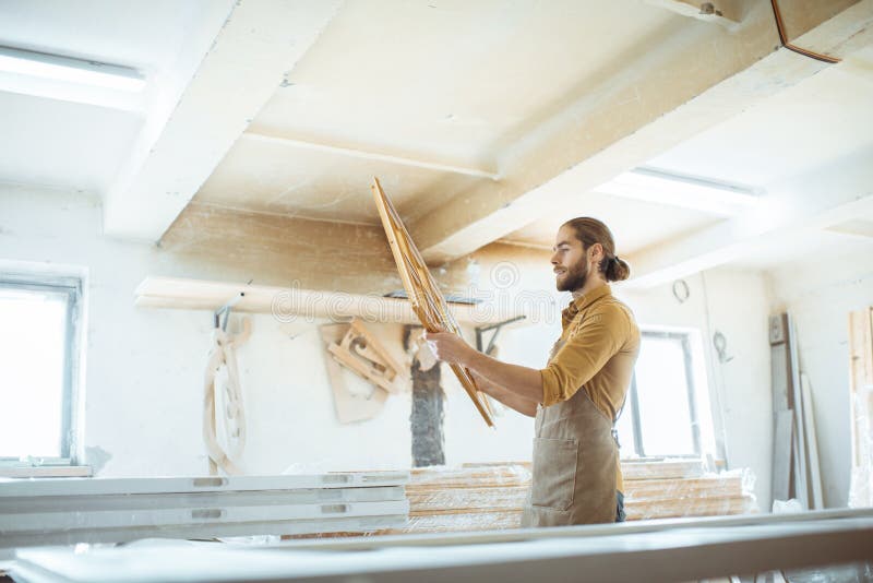 Carpenter with Window Frame at the Workshop Stock Photo - Image of ...