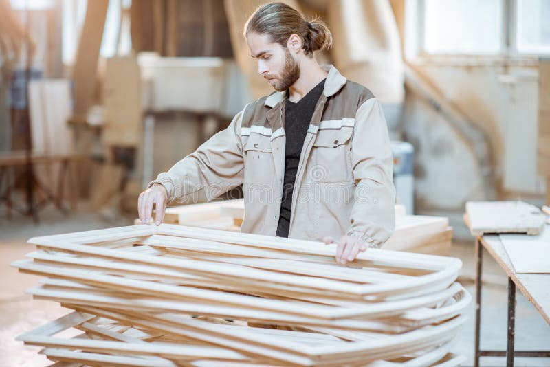Carpenter with Window Frame at the Workshop Stock Photo - Image of ...