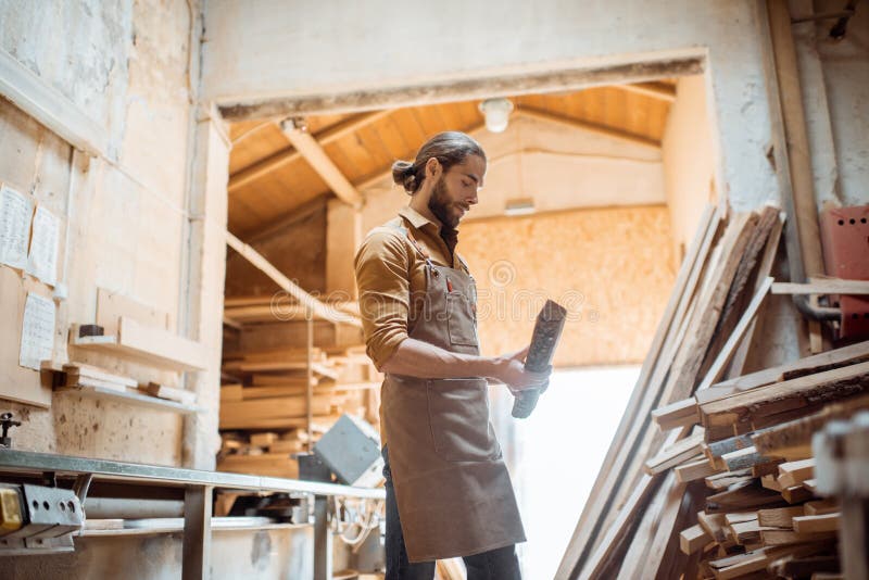 Carpenter at the Wood Storage Stock Photo - Image of storage, woodwork ...