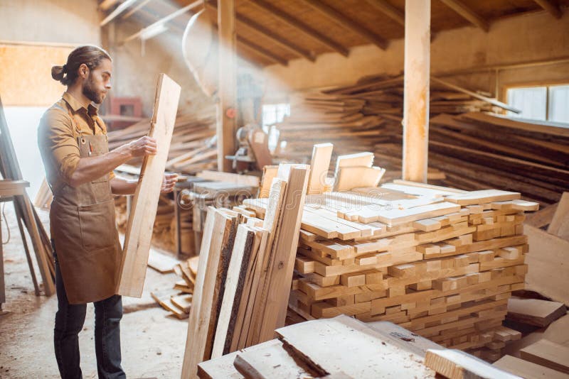 Carpenter at the Wood Storage Stock Photo - Image of pine, pile: 204513762
