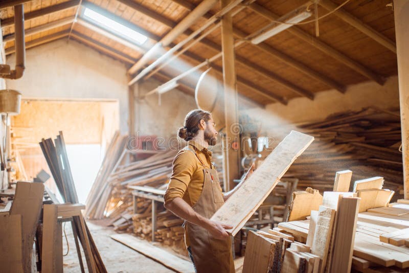 Carpenter at the Wood Storage Stock Image - Image of industrial, pine ...