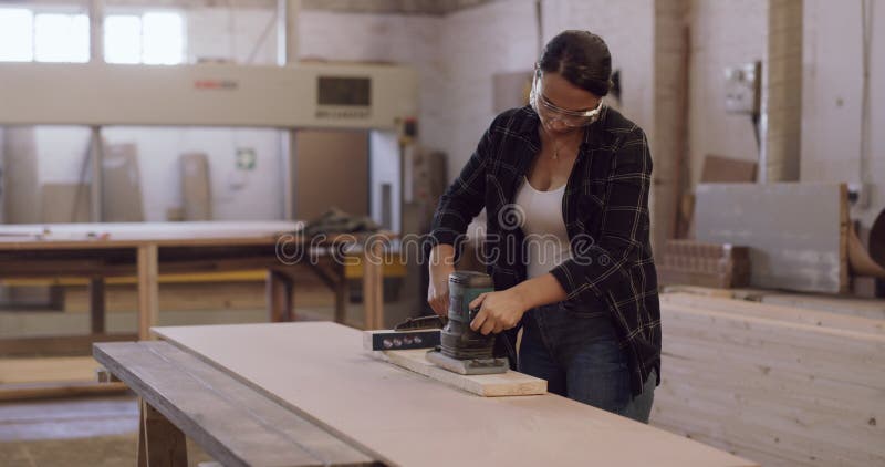 Carpenter, Wood and a Woman Sanding in a Workshop for Creativity and ...