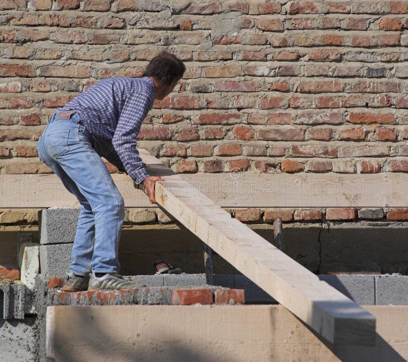 Carpenter at Work stock image. Image of employment, construction - 1410577