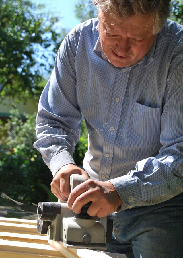 Carpenter at work stock photo. Image of pine, electro - 14334618