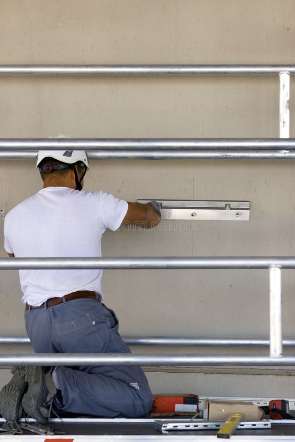 Carpenter at work stock photo. Image of plans, construction - 15481622