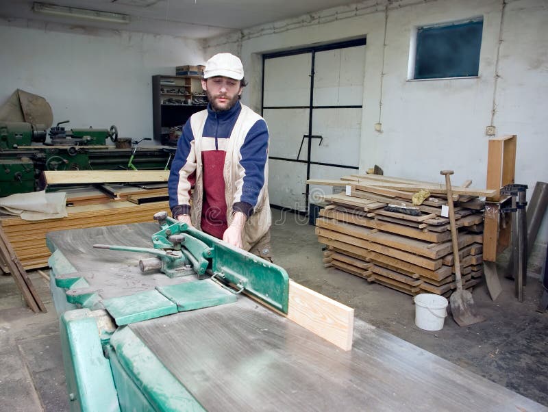 Carpenter at work. stock image. Image of machinery, lumber - 2133913