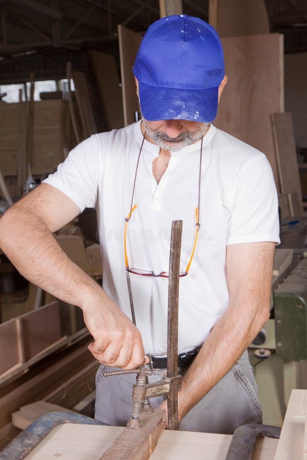 Carpenter at work stock photo. Image of home, cutting - 93873938