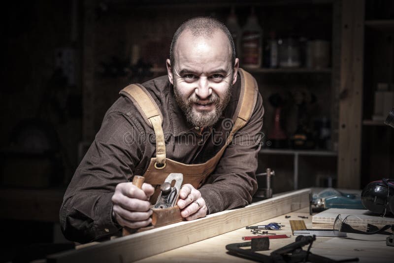 Carpenter at work stock photo. Image of equipment, manual - 136619628